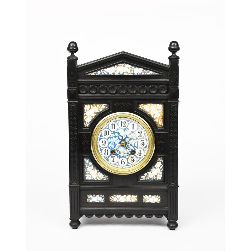 An aesthetic movement ebonised wood mantel clock in the manner of lewis ...