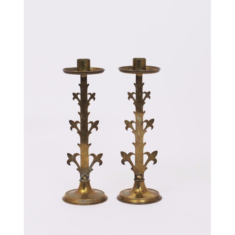 A rare john hardman & co pair of brass candlesticks designed by a.w.n ...