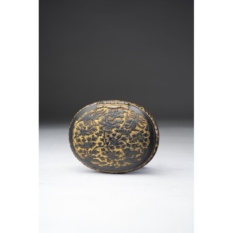 A japanese parcel-gilt bronze sawasa tobacco box | Woolley and Wallis
