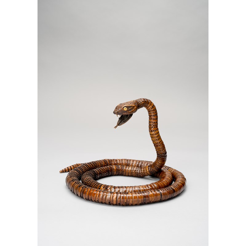 A rare and impressively long japanese wood jizai okimono (articulated ...
