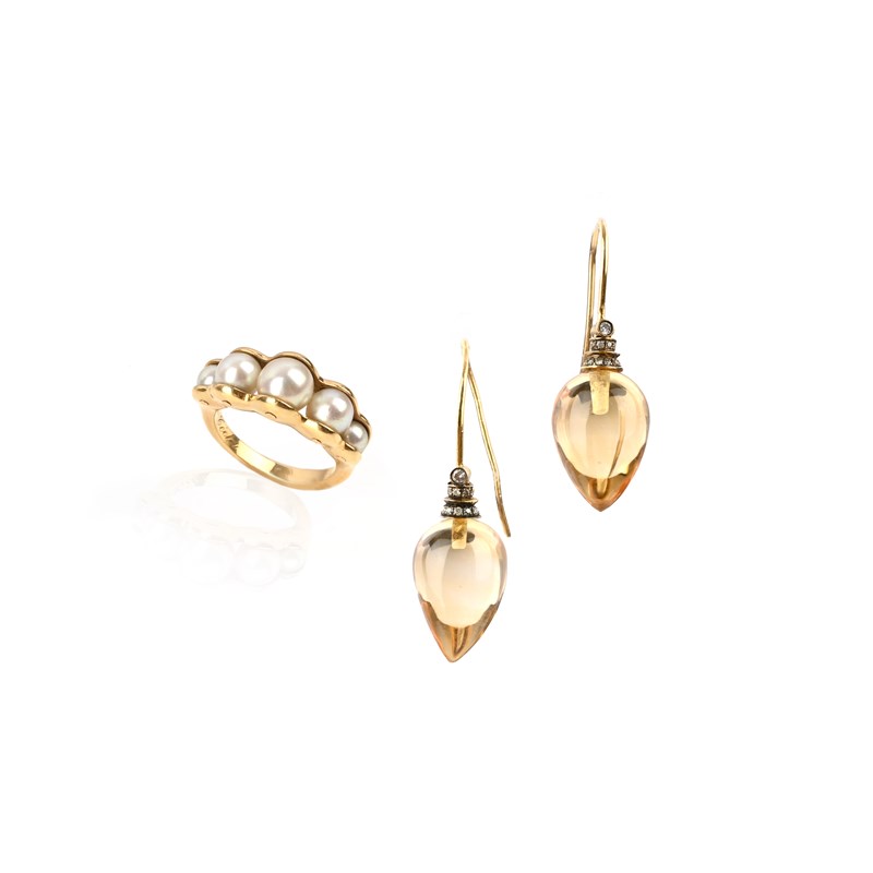 Técla, a cultured pearl half-hoop ring | Woolley and Wallis