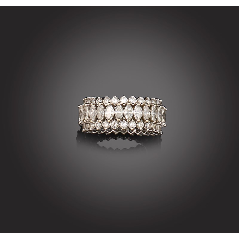 A diamond full eternity ring, of openwork construction, set with a ...