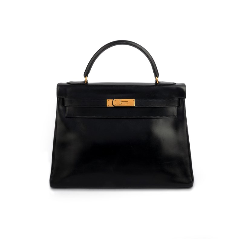Hermès, a vintage black box calf leather retourne kelly 32 | Woolley ...