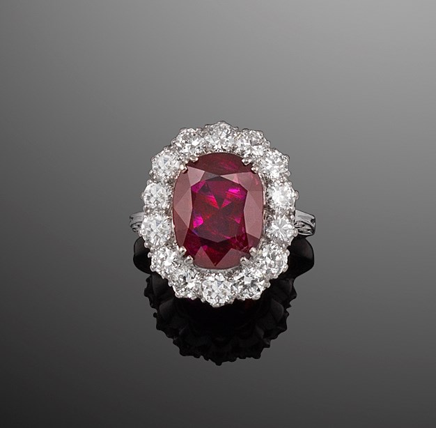 a burmese ruby and diamond cluster ring | Woolley and Wallis