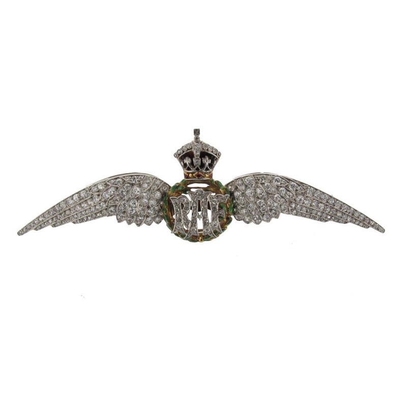 A diamond set raf wings brooch. set overall with small diamonds in gold ...