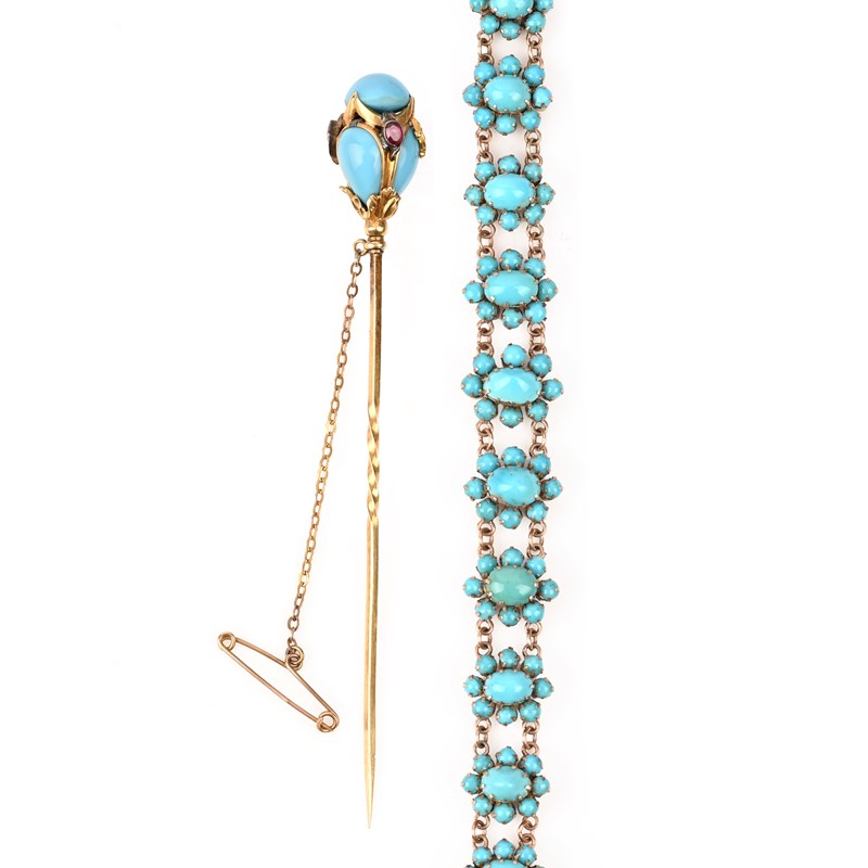 A turquoise-set gold bracelet and hat pin | Woolley and Wallis