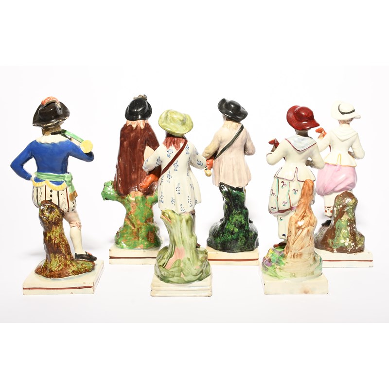 Six staffordshire figures of musicians, c.1800-20, two of hurdy-gurdy ...