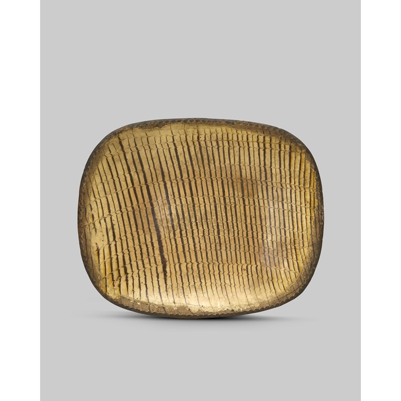 A large isleworth combed slipware dish, 18th century, the shallow ...