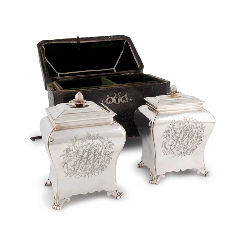 A graduated pair of george iii silver tea caddies,by daniel smith and ...