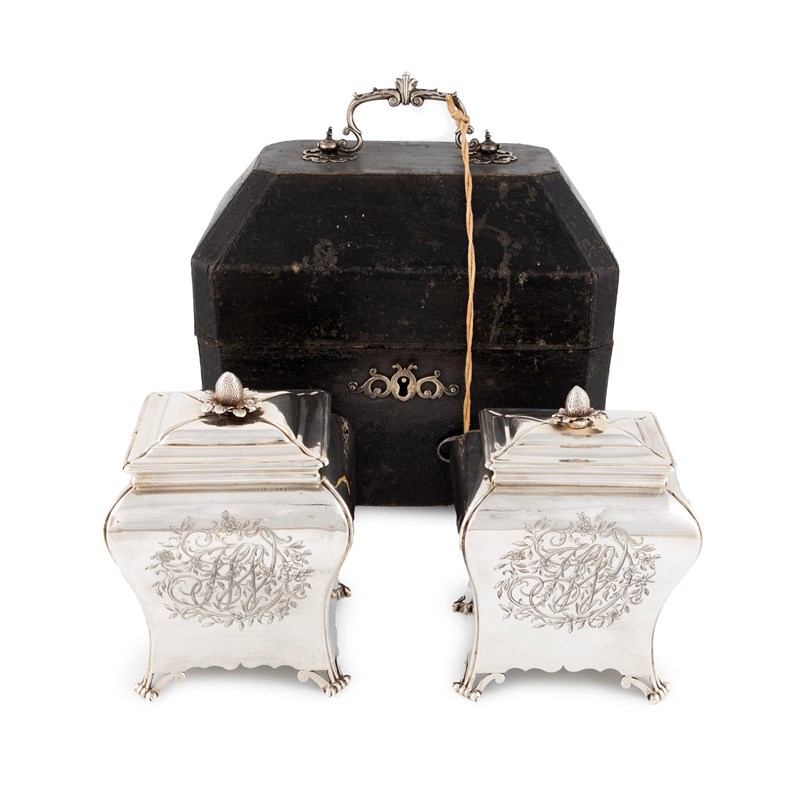 A graduated pair of george iii silver tea caddies,by daniel smith and ...