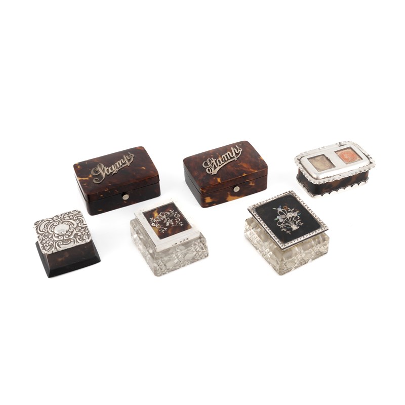 Λ a collection of antique silver and tortoiseshell stamp boxes ...