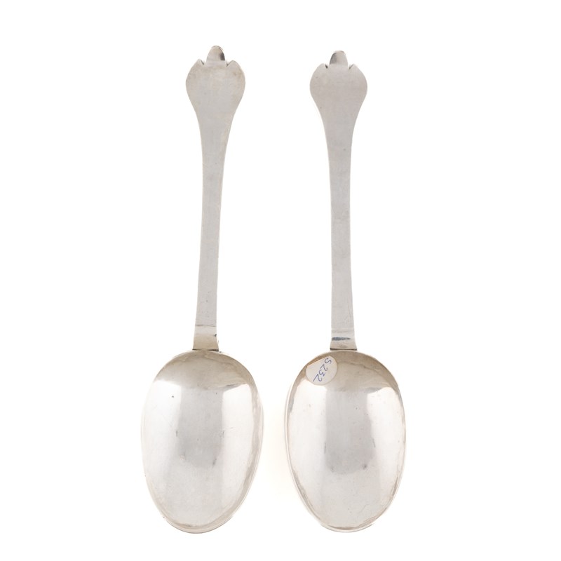 A pair of james ii silver trefid spoons, | Woolley and Wallis