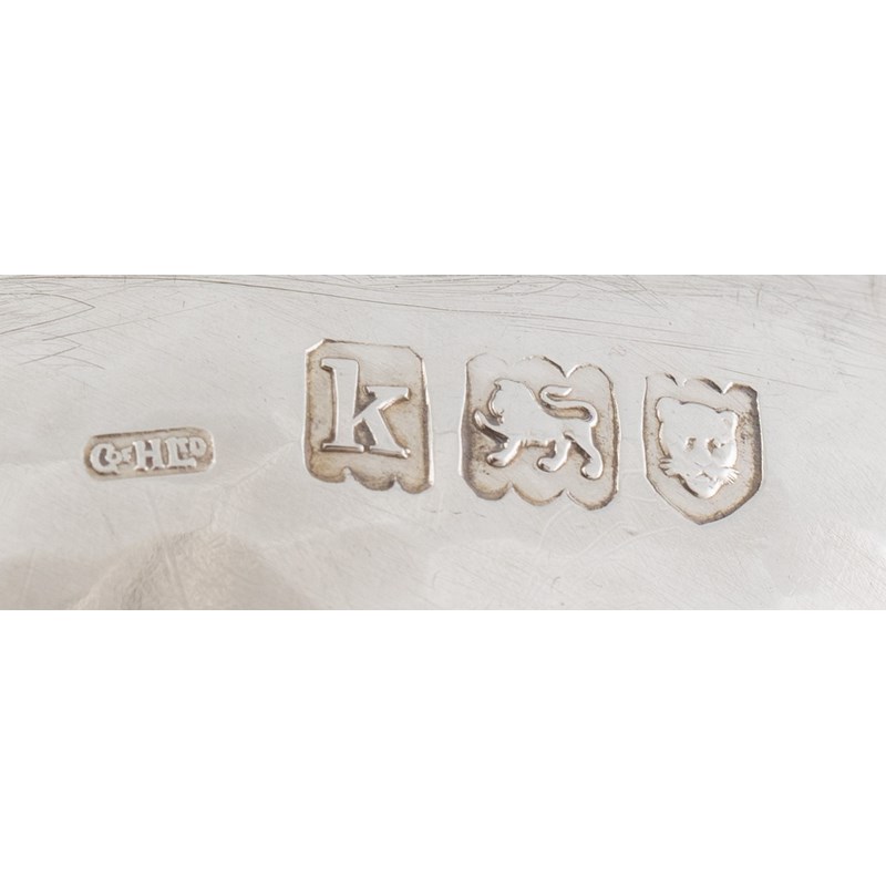 By the guild of handicraft limited, a pair of arts and crafts silver ...
