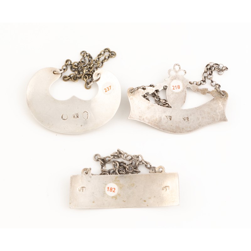 Three george iii irish silver wine labels, | Woolley and Wallis