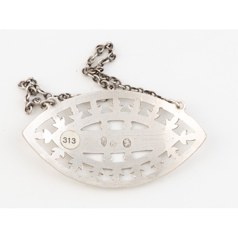 A george iii irish silver wine label, | Woolley and Wallis