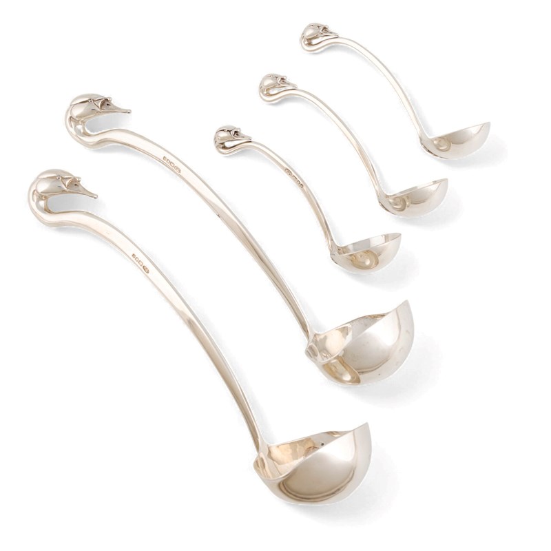 By sarah jones, a pair of large modern silver swan head ladles ...