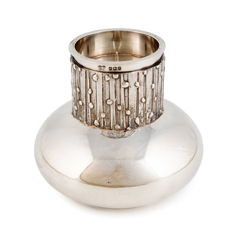 By brian asquith, a modern silver candlestick/vase, | Woolley and Wallis