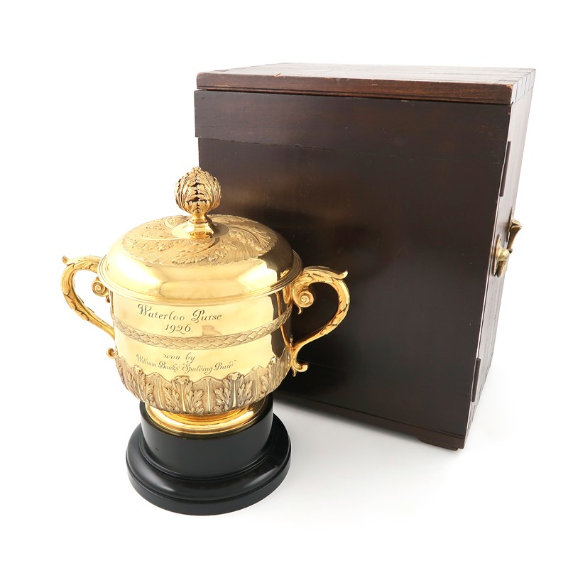 The waterloo cup, a silver-gilt two-handled coursing trophy cup and ...