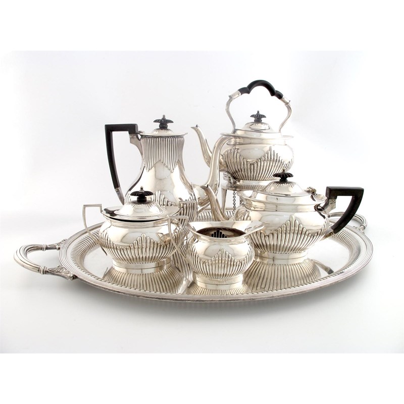 A five-piece electroplated tea and coffee set and tray | Woolley and Wallis