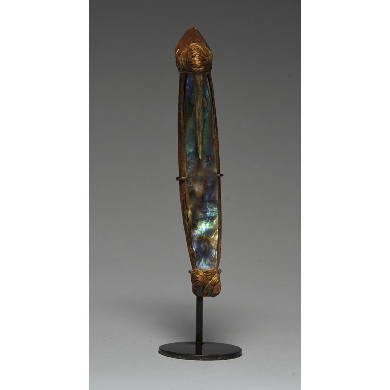 A maori fish hook | Woolley and Wallis