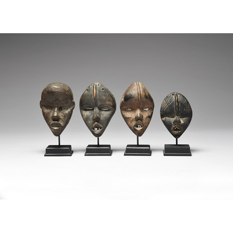 Four dan passport masks | Woolley and Wallis