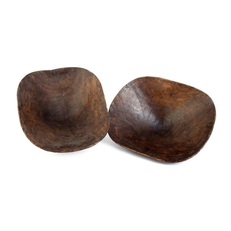 Two zimbabwe wooden gold-panning bowls | Woolley and Wallis