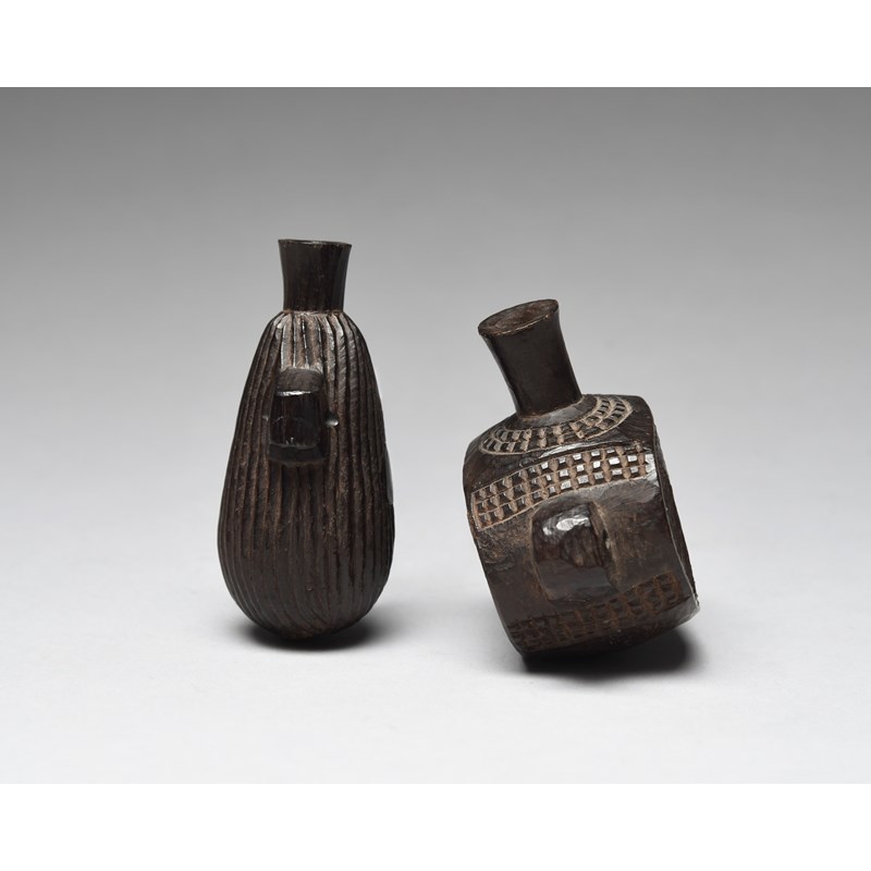 Two shona snuff bottles | Woolley and Wallis