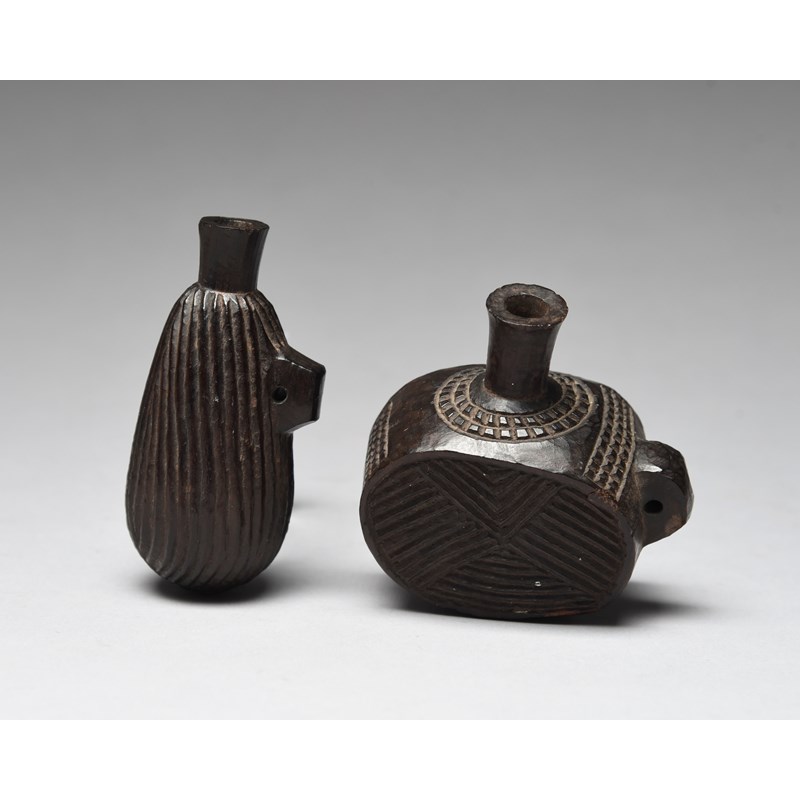 Two shona snuff bottles | Woolley and Wallis
